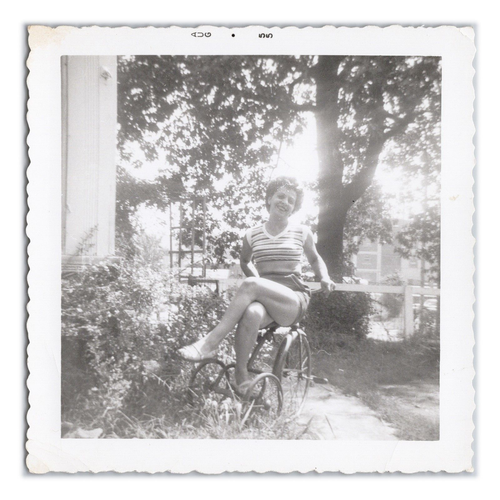 Girl Riding Tricycle In Garden Snapshot 1950s Leggy Woman In Crop Top ...
