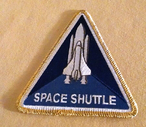 SPACE SHUTTLE PATCH NEW GOLD TRIM BLUE WHITE TRIANGLE TRIANGULAR SOUVENIR BADGE. | eBay