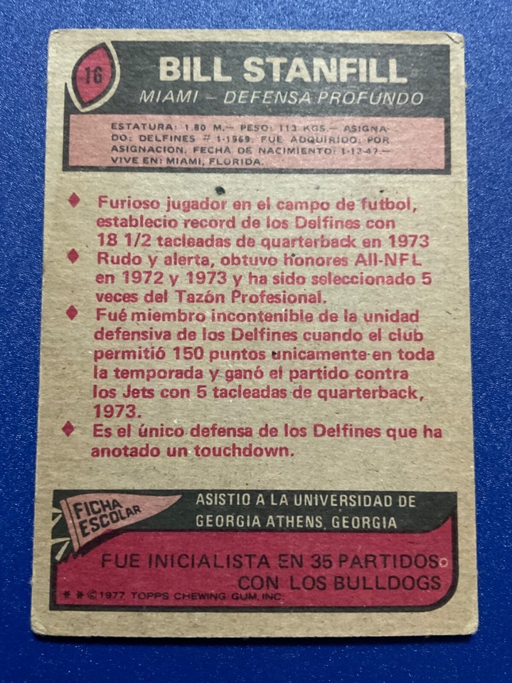 1977 Topps Mexican #16 Bill Stanfill of the Dolphins. Card is a short ...