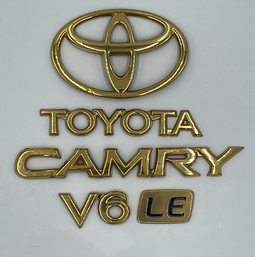 97 98 99 00 01 TOYOTA CAMRY LE V6 GOLD REAR TRUNK EMBLEM ORNAMENT BADGE ...