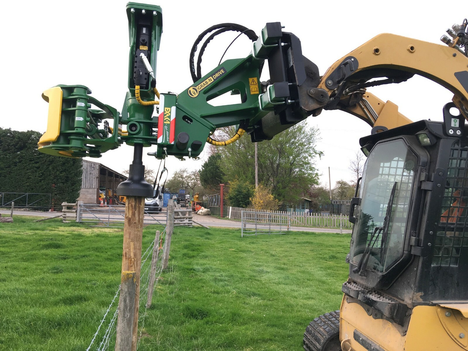 Grab-n-Drive fence post driver attachment model GD30S with log grapple ...