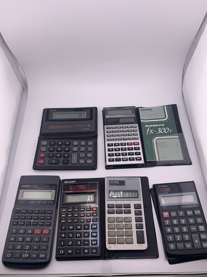 Lot of Six Vintage Calculators, Sharp, Casio, Canon ,Texas Instruments ...