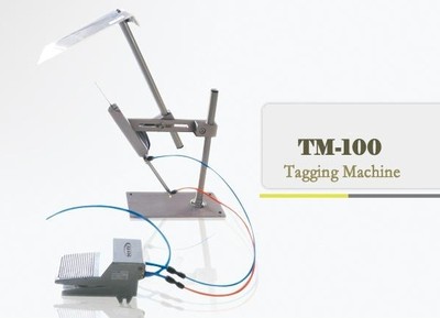 automatic Tagging Machine,TM-100 3" for socks, carpet, towels,clothing ...