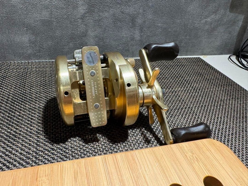 Shimano 00 CALCUTTA CONQUEST 200 Reel Baitcasting Fishing Gold No Box ...