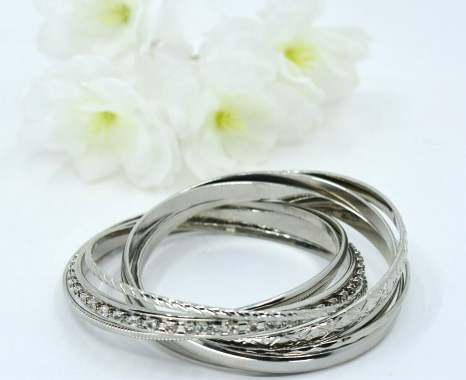 Bangle Bracelets Silver Tone Stack of 8 Connected Nice Bangle Bracelets ...