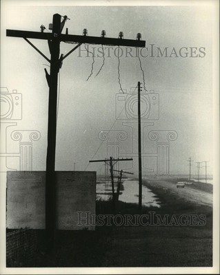 1963 Press Photo Snapped power-lines on High Island, TX after Hurricane ...