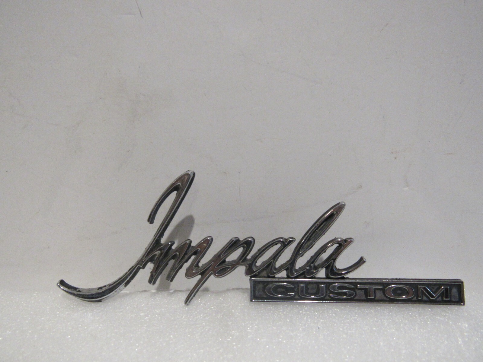 VINTAGE CHEVY IMPALA EMBLEM BADGE NAME PLATE METAL SCRIPT | eBay