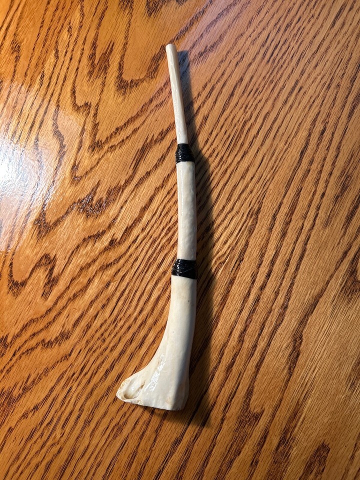 Bone wing turkey call. It is a primitive turkey call made from a turkey ...