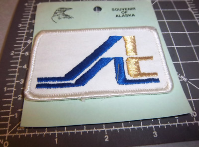 AIC Alaska Embroidered Patch, im guessing the letters are AIC actually ...