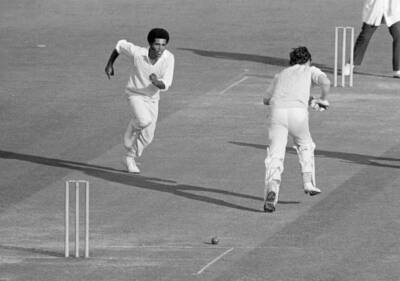 Kent bowler Bernard Julien looks for a possible run out as K - Cricket ...