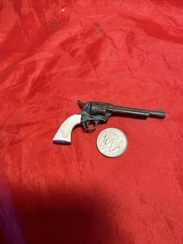 Miniature Keychain Toy Colt 45 Revolver With Long Horn Steer On White ...