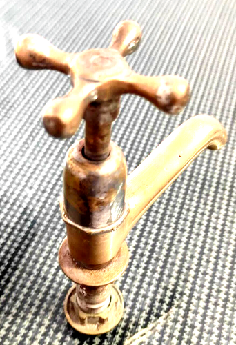 Sold brass Angled Basin Taps ,it have a square locating lug below,4 ...
