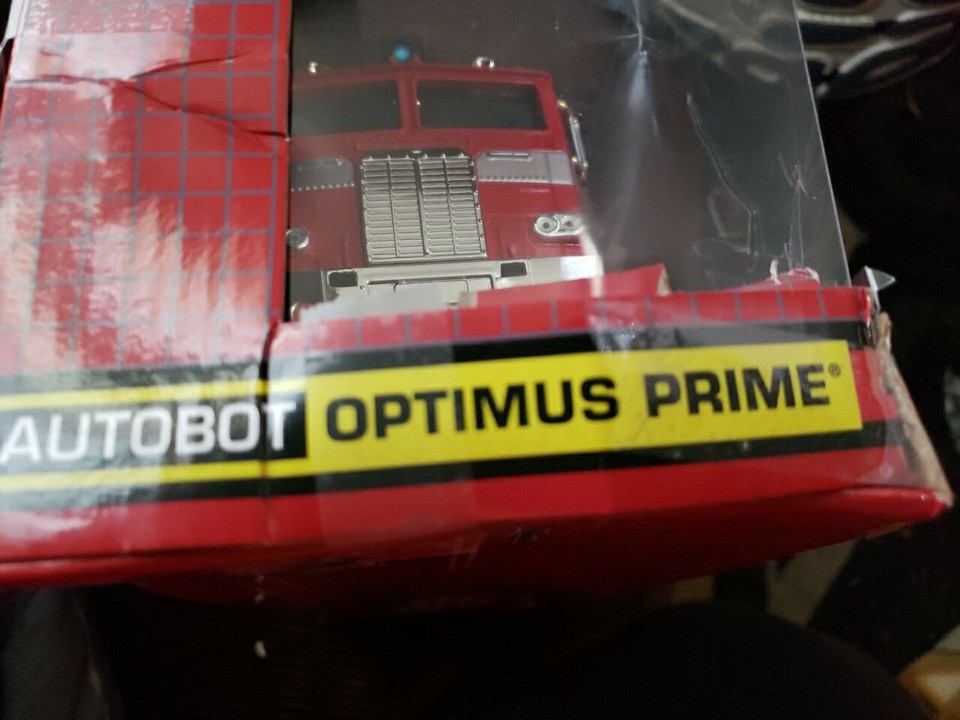 Red Transformers G1 Optimus Prime Truck with Robot on Chassis Die-cast ...