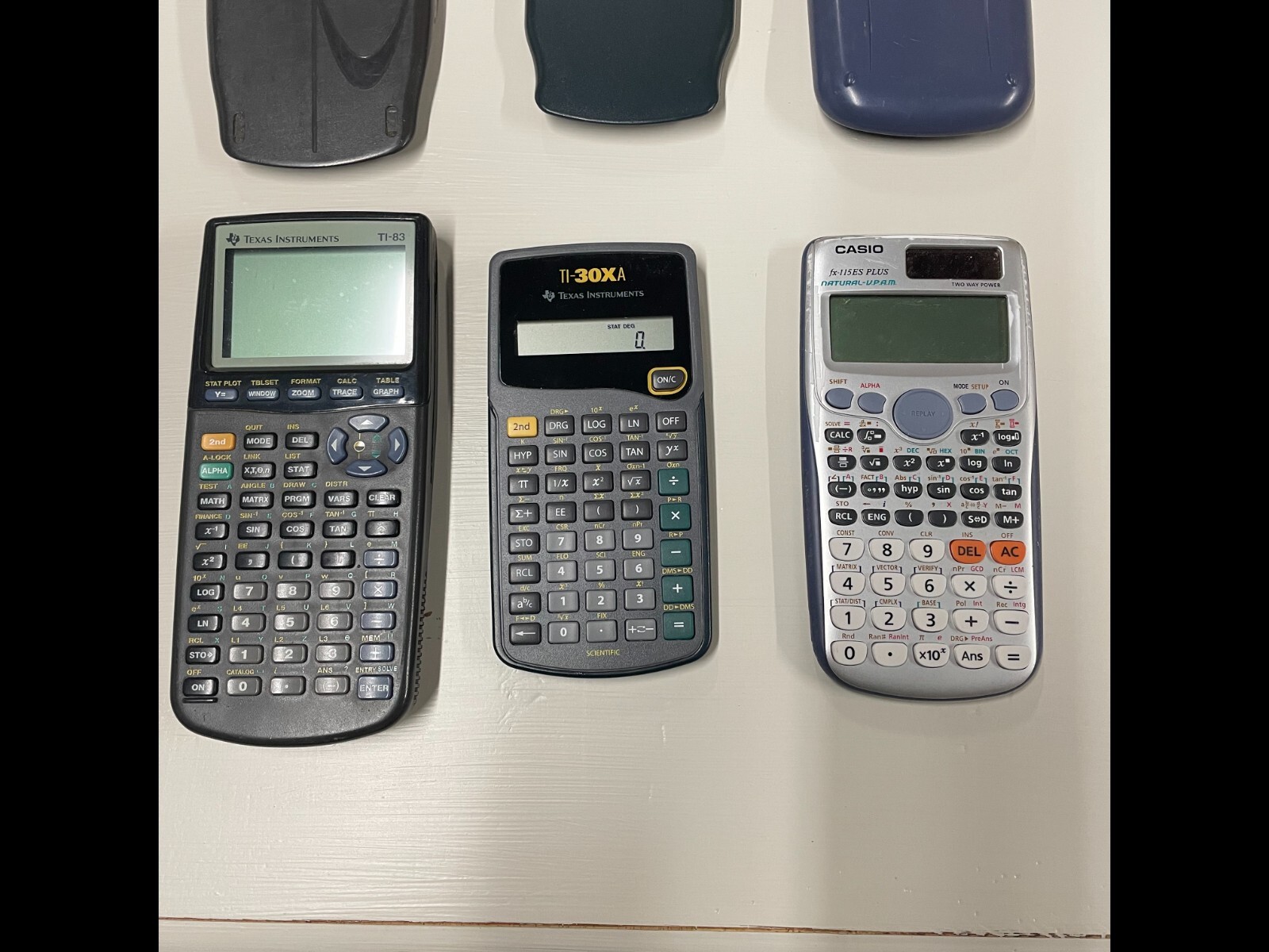 Calculators Bundle of 3 - 1 Texas Instrument T1-30XA & T1-83 + 1 Casio ...