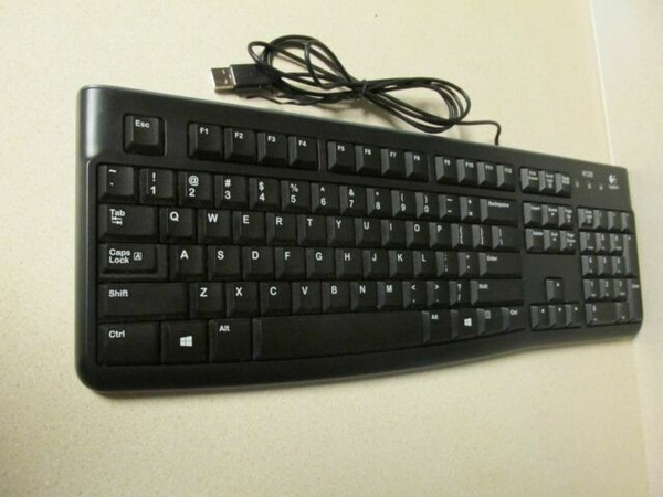Logitech k120 keyboard keys sticky spilled - topiallka
