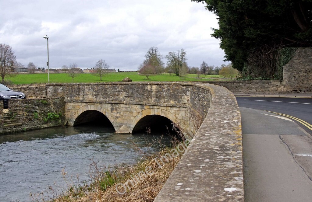 Photo 6x4 Road bridge over River Coln, Fairford The bridge carries the ...