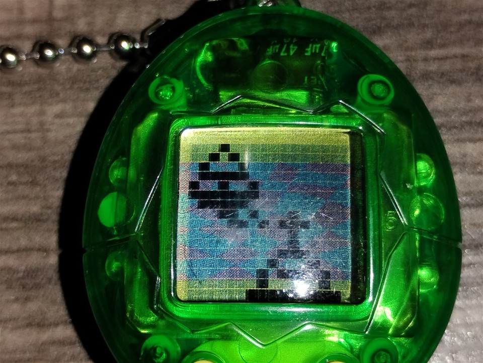 Genuine Tamagotchi Mini Bandai Virtual Pet Game Translucent Green ...