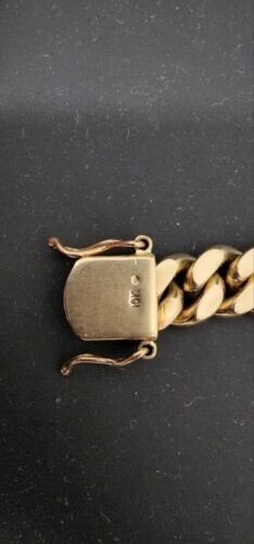 10 karats of 49 grams of SOLID gold Cuban link style … - Gem