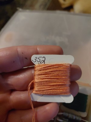 spool of DMC 352 Salmon embroidery thread | eBay