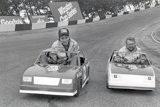 Steve Mitchell and Mark McCain race around the track before the Mot ...