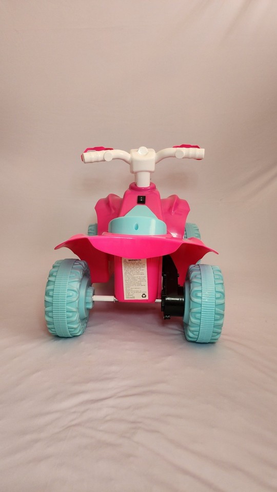 Barbie 6V ATV Ride On Toy by Mattel is a pink vehicle designed for kids ...