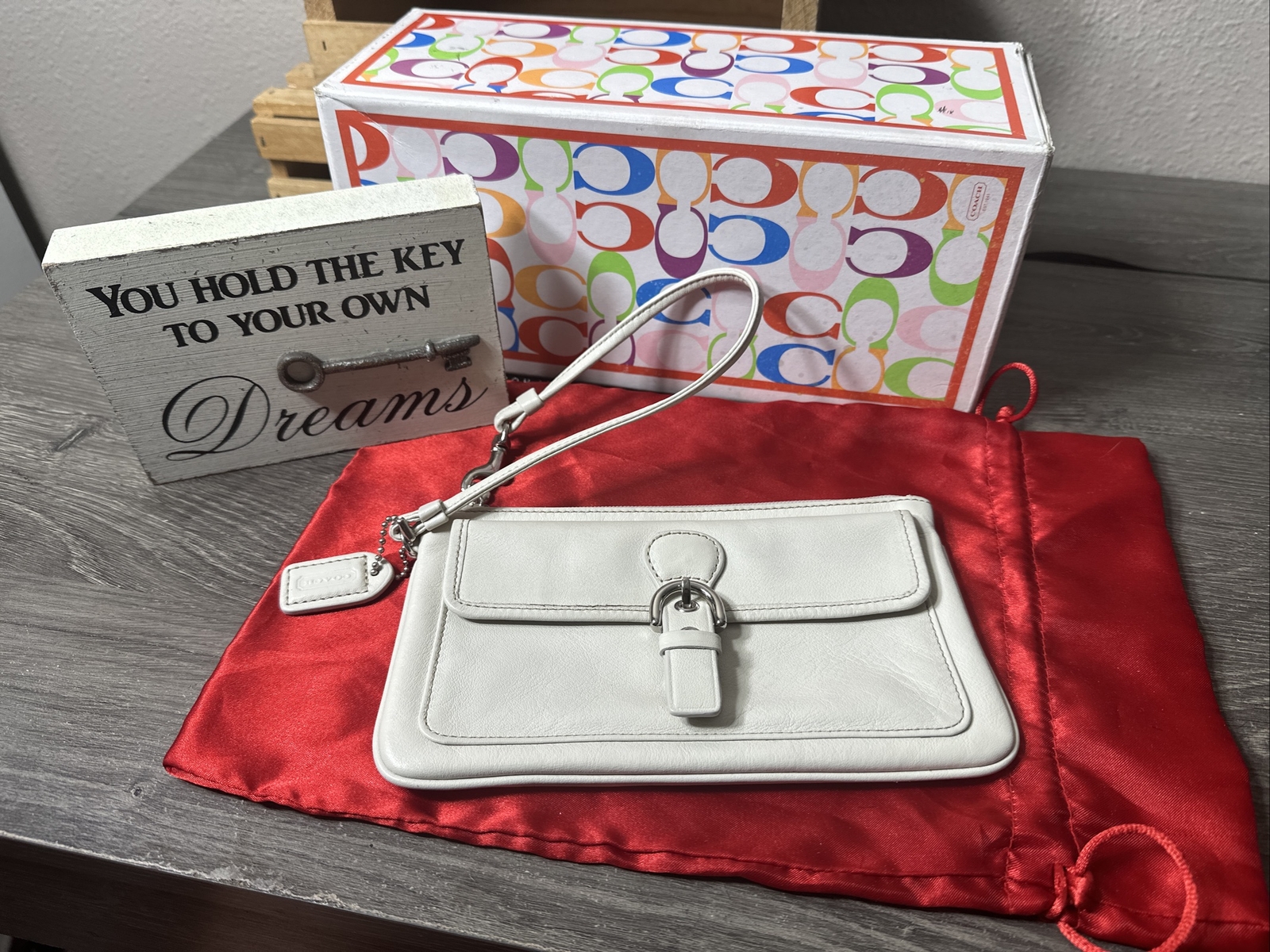 COACH Ivory Leather Logo Rectangle Zip Wallet Wristle… - Gem