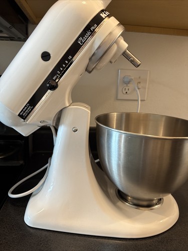 White Kitchen Aid classic plus standing mixer with three attachments ...
