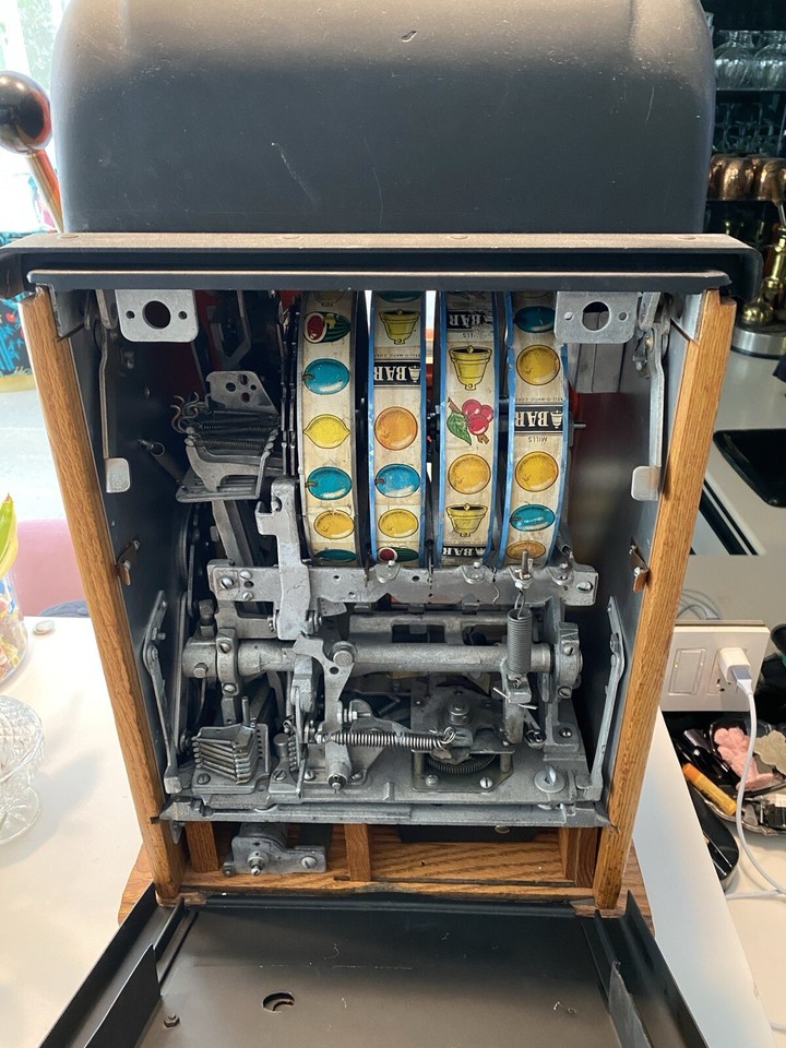 Vintage Mills 4-reel slot machine | eBay