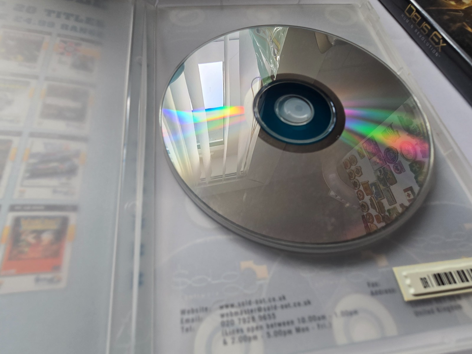 Deus ex 2003 and Deus Ex Human Revolution 2011 Pc Cd-Rom games( windows ...