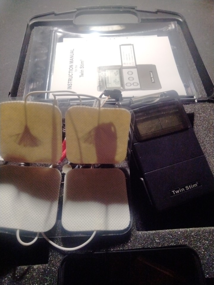 Twin Stim TENS/EMS Unit Handheld with Electrodes and Accessories | eBay