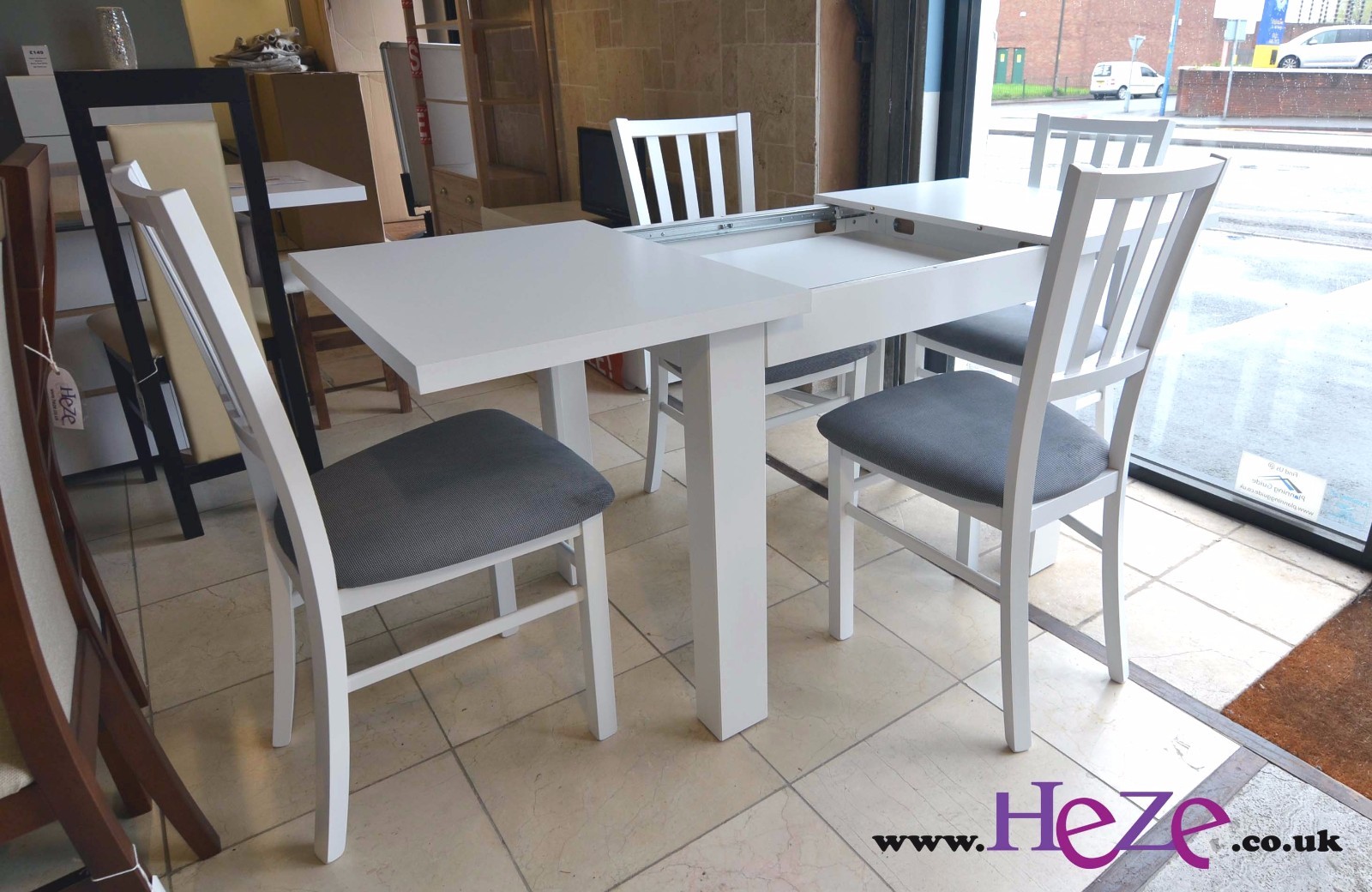 White extending dining table, strong and solid, great size perfect for ...