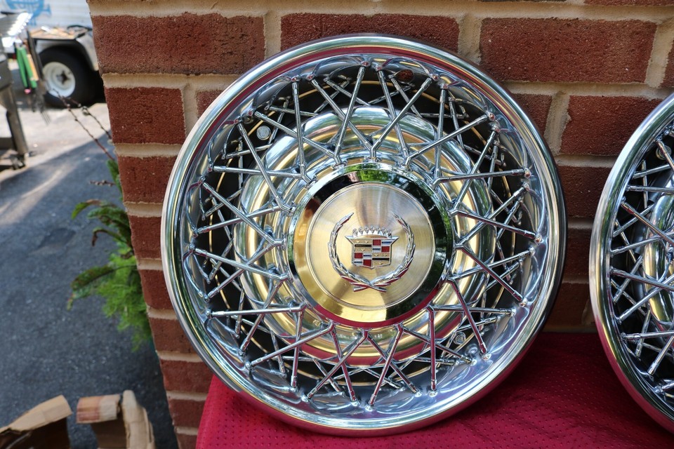 75-85 CADILLAC DEVILLE FLEETWOOD SEVILLE NOS 15" WIRE HUBCAPS GM ...