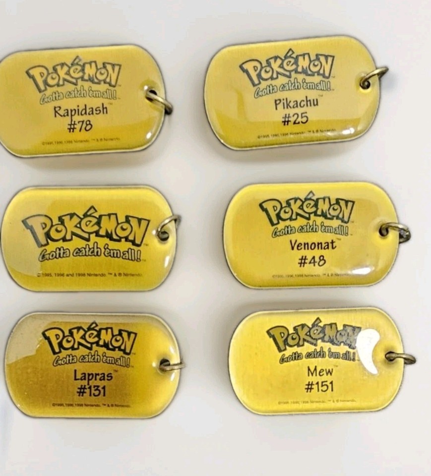 1998 Pokémon Dog Tags Set Of 6 Charizard Golduck Scyther Cubone Magmar ...