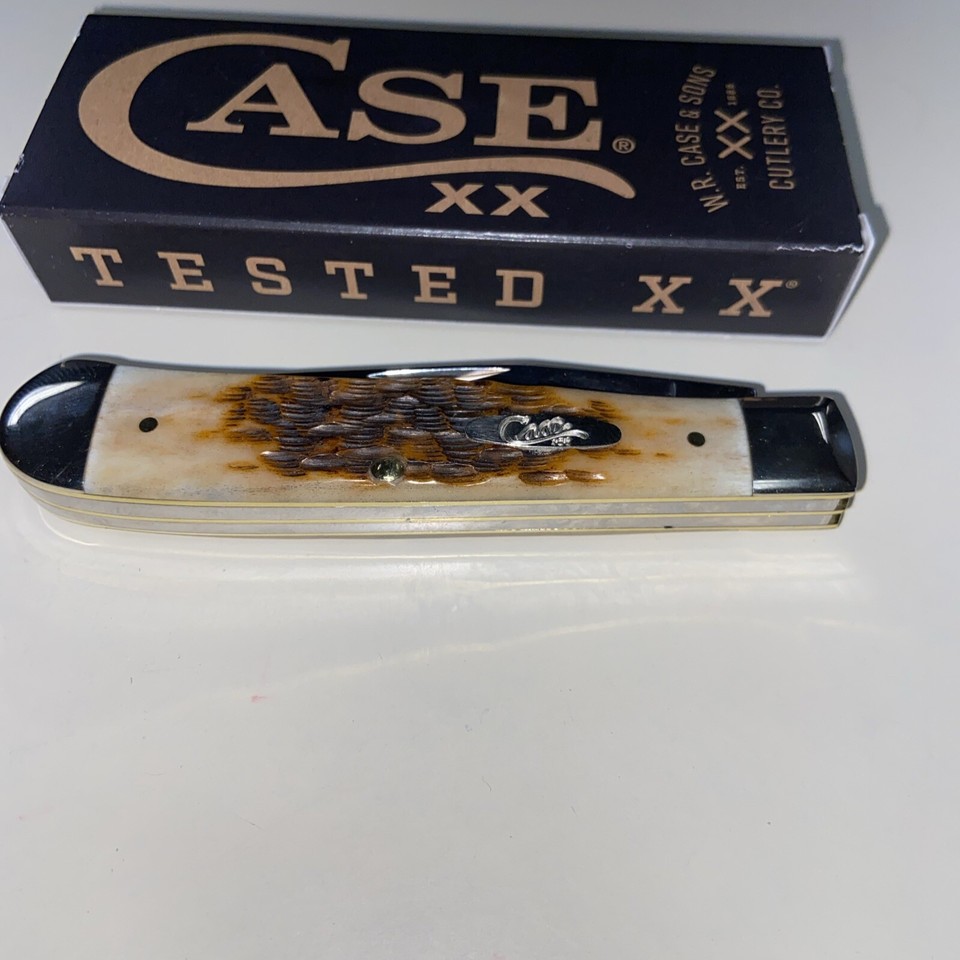 CASE XX #00164 AMBER BONE PEACH SEED JIG TRAPPER SS | eBay