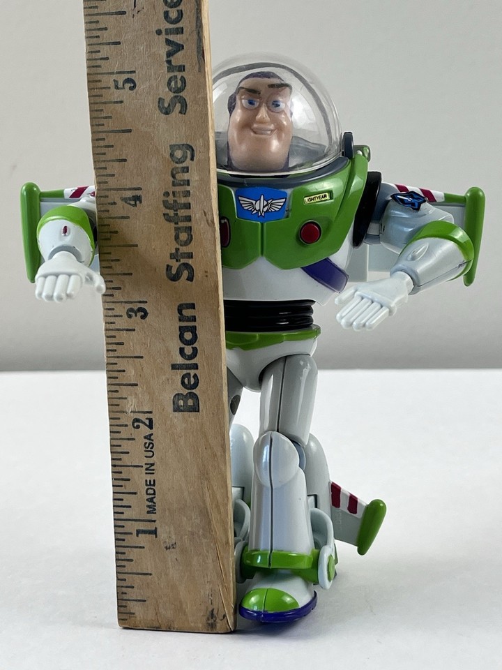 Thinkway Toy Story Buzz Lightyear Retractable Wings & Rockets on Legs ...