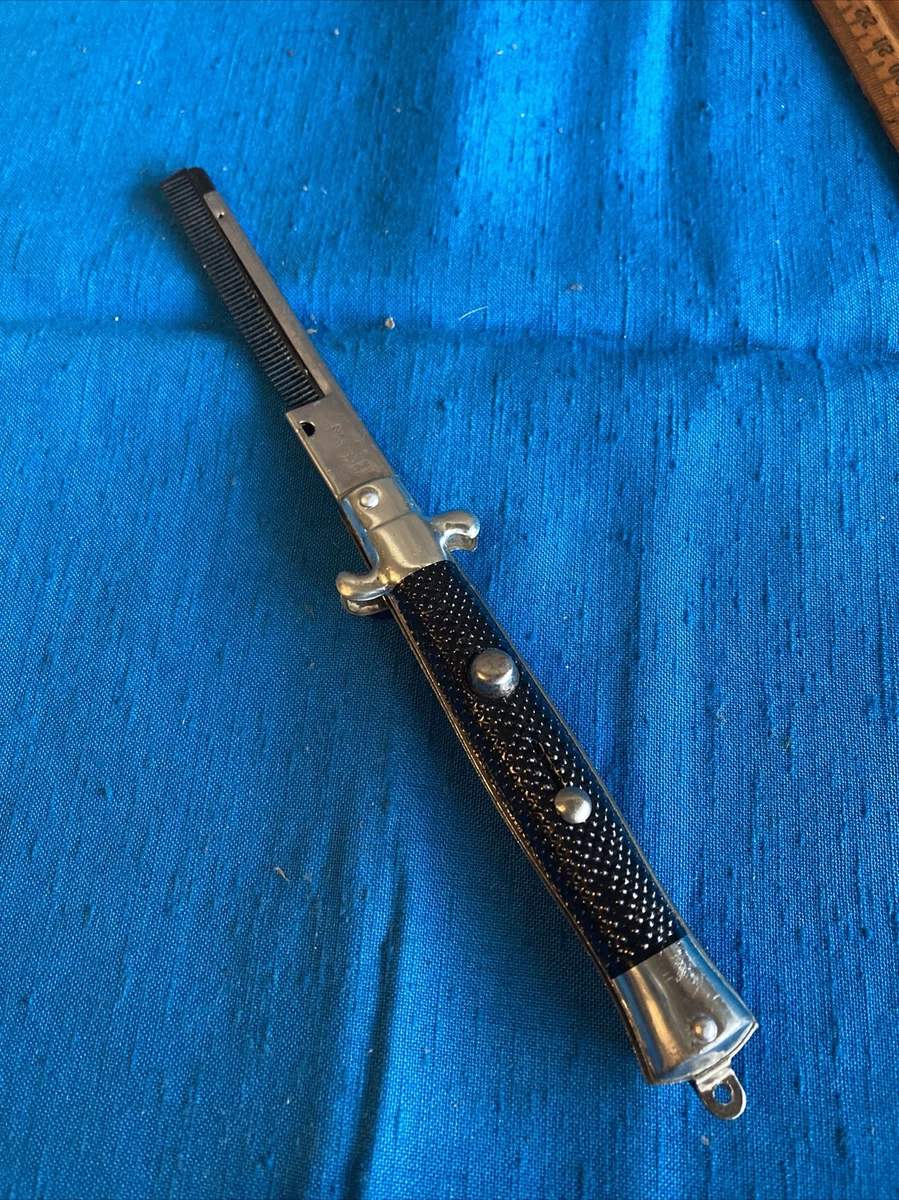 Switchblade Comb