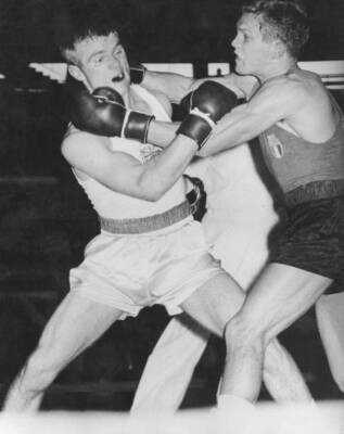 Britain's Willie Fisher & Italian boxer Carmelo Bossi during their l ...