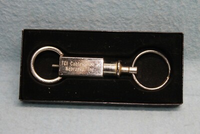 One circa 1980s TCI Cablevision of Nebraska heavy keychain in original ...