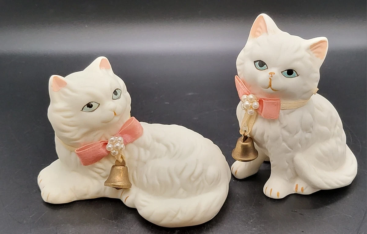 White Cat With Bell Ribbon