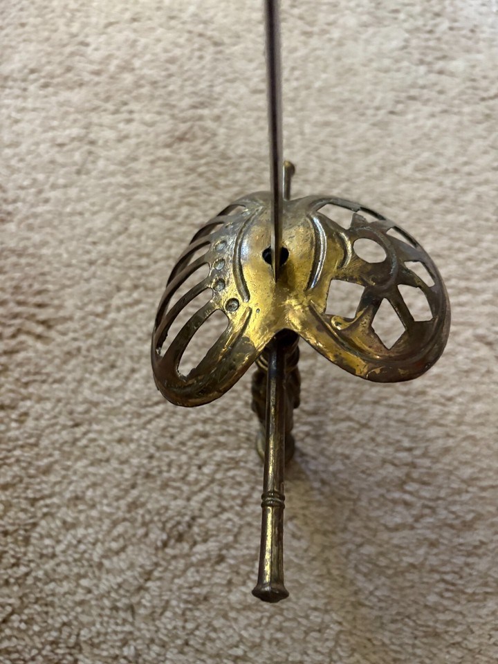 Decorative Rapier with intricate details on the blade and grip. | eBay