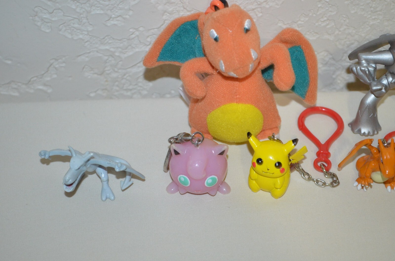 Lot of Pokemon Figures and Plush Keychains - Charizard Pikachu Rapidash ...