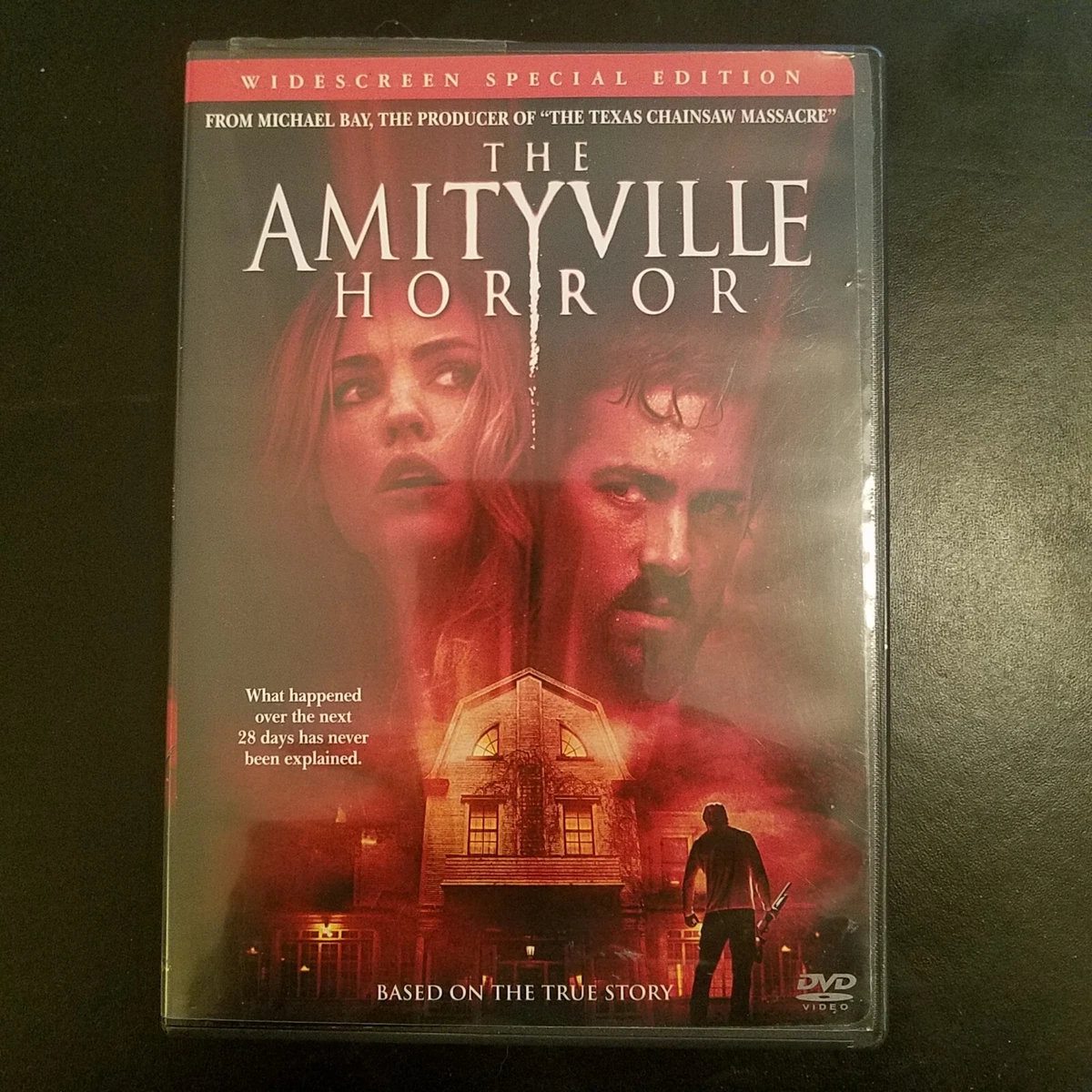 Ryan Reynolds Amityville Horror Chopping Wood