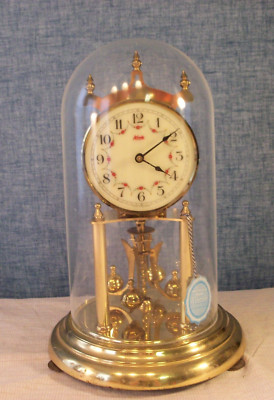 Anniversary clock with flower face, Kundo, made by Kieninger ...