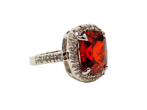 Red cubic zircona stone ring with clear CZ stones on the band, sides ...