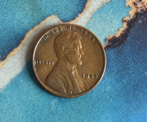 1944 Lincoln wheat penny no mint mark. One Cent Coin, Rim Error “L” In ...