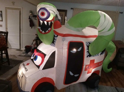 Gemmy Inflatable ambulance w/1 eyed green serpentine monster - eye ...