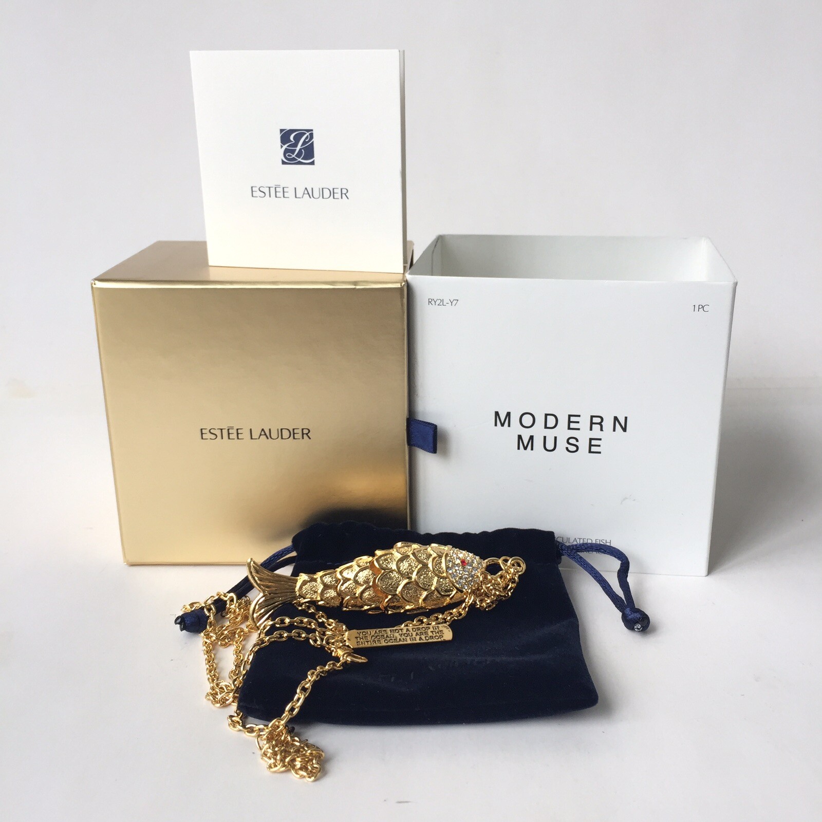 Estee Lauder Modern Muse Golden Articulated Fish Solid Perfume Necklace ...