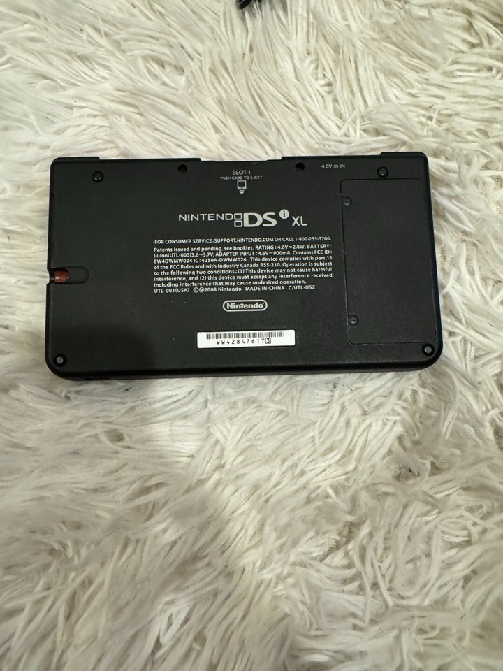Nintendo DSi XL 25th Anniversary Edition with New Mario Bros. Red ...