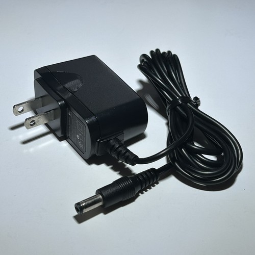 Logitech Switching Adapter P/N: 534-000299 Model ASUC12A-100070 10V 0 ...