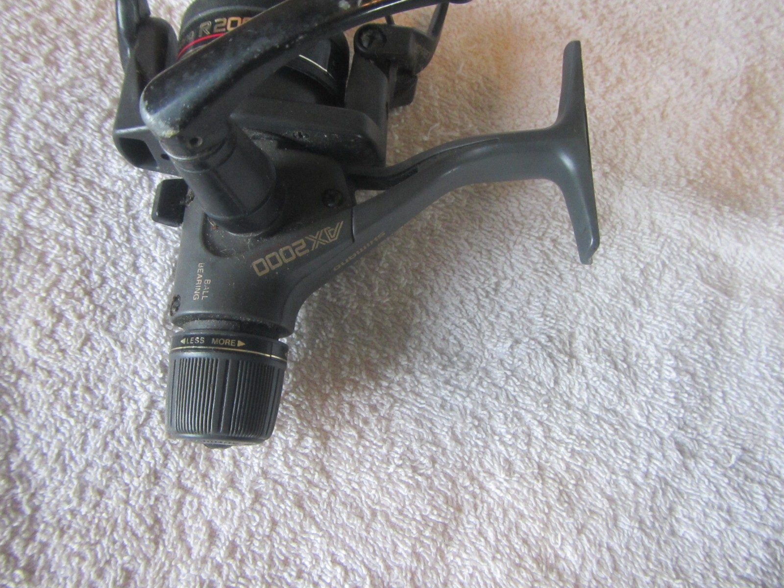 Lot of 2 shimano open face fishing reels 2000 & R2000 | eBay